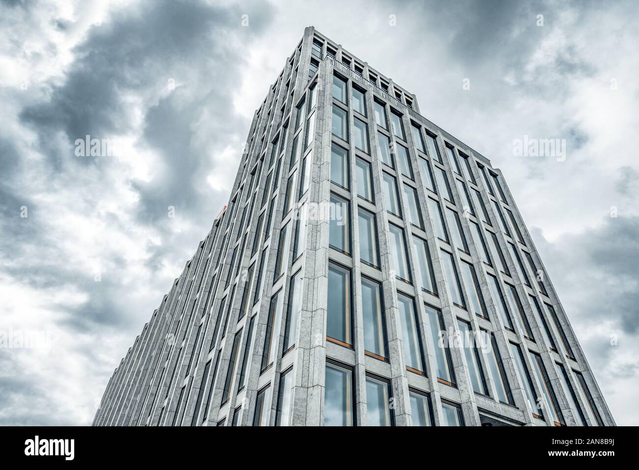 Office building against overcast sky hi-res stock photography and ...
