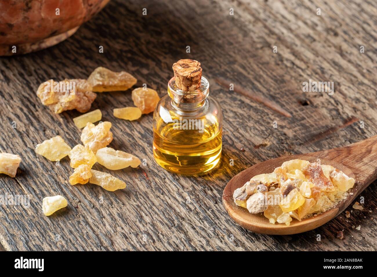 A bottle of frankincense essential oil and resin Stock Photo - Alamy