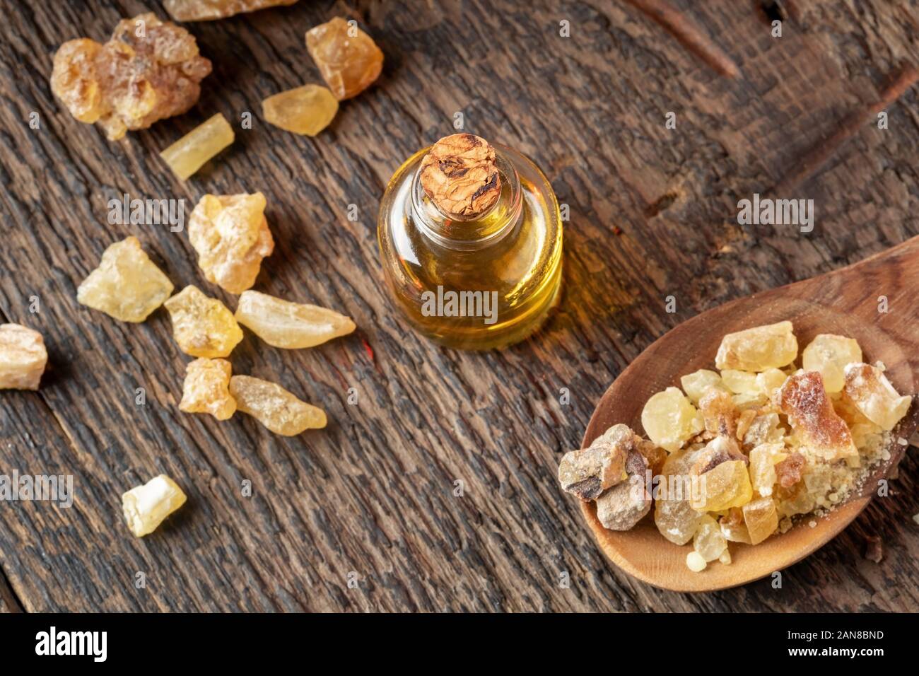 A bottle of essential oil with frankincense resin Stock Photo - Alamy