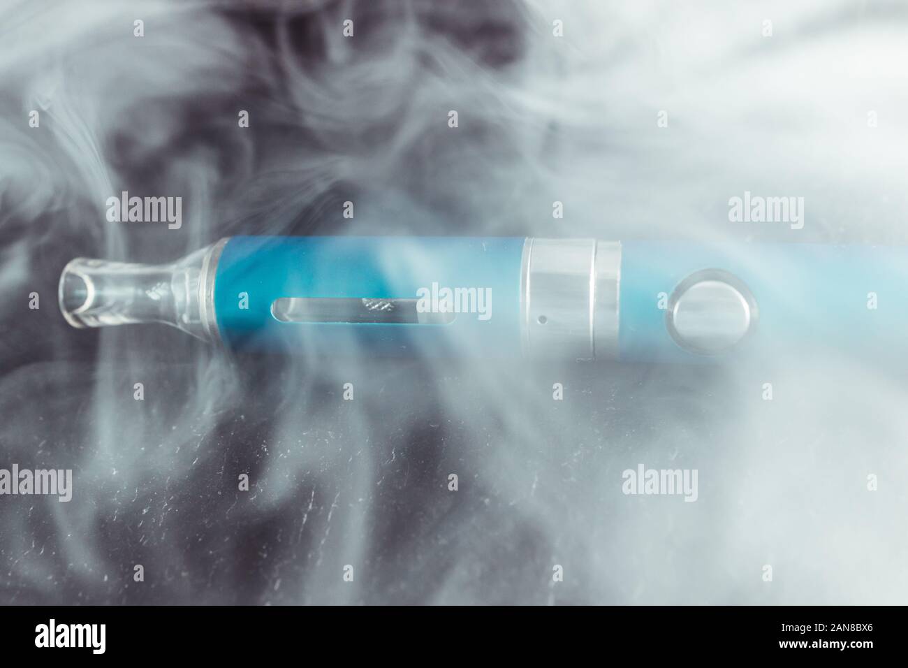 Vape pen metal electronic cigarette with vaping smoke cloud dark ...