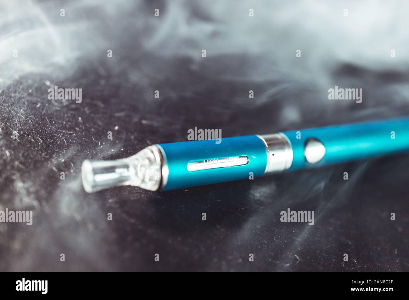Vape pen metal electronic cigarette with vaping smoke cloud dark ...