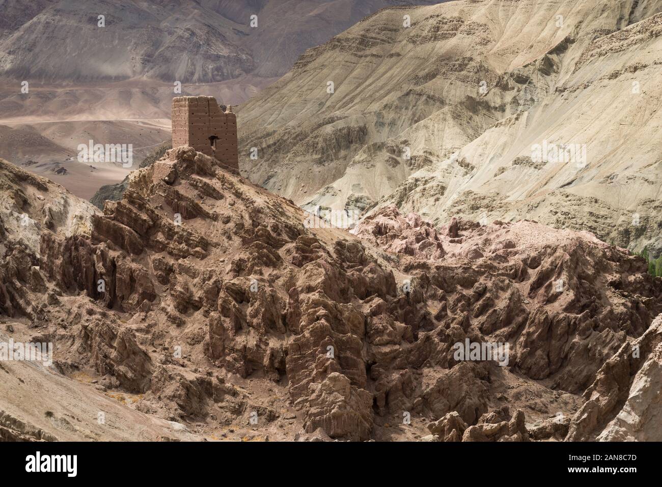 The lunar landscape of Ladakh surrounding Basgo Castle atop a mound ...