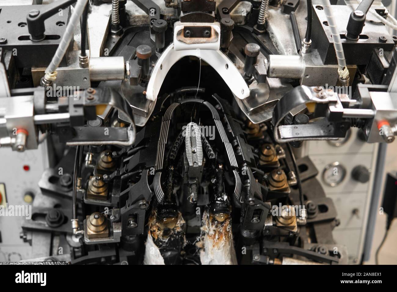 Man use special machine tool for making a shoes. The conveyor on a ...