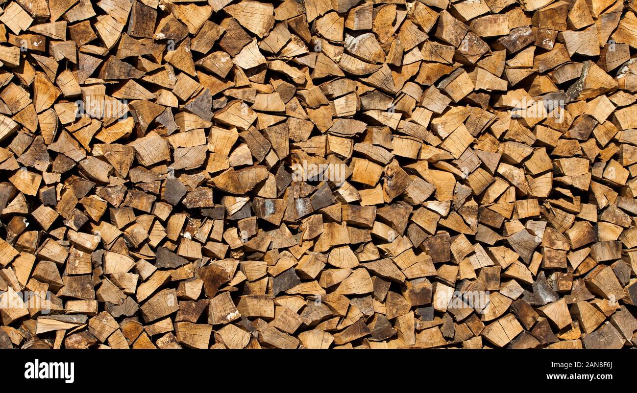 pile of cut wood for fire Stock Photo - Alamy