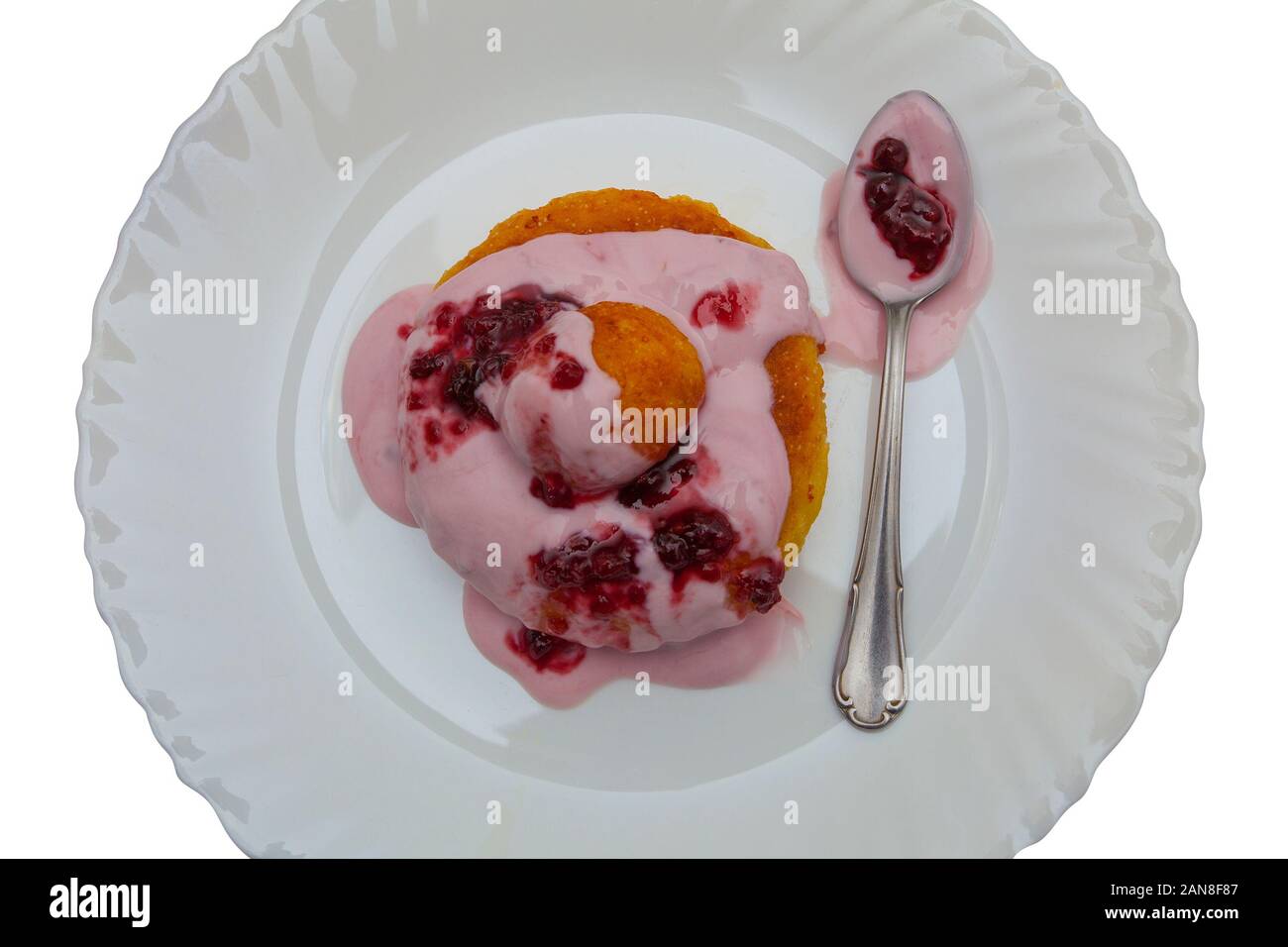 romanian cheese donuts with yoghurt and raspberry jam and spoon ...