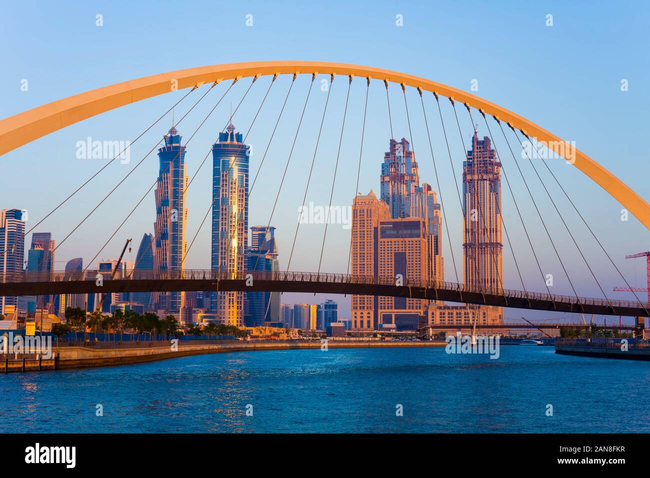 Dubai city skyline at sunset. view of Tolerance bridge Stock Photo - Alamy