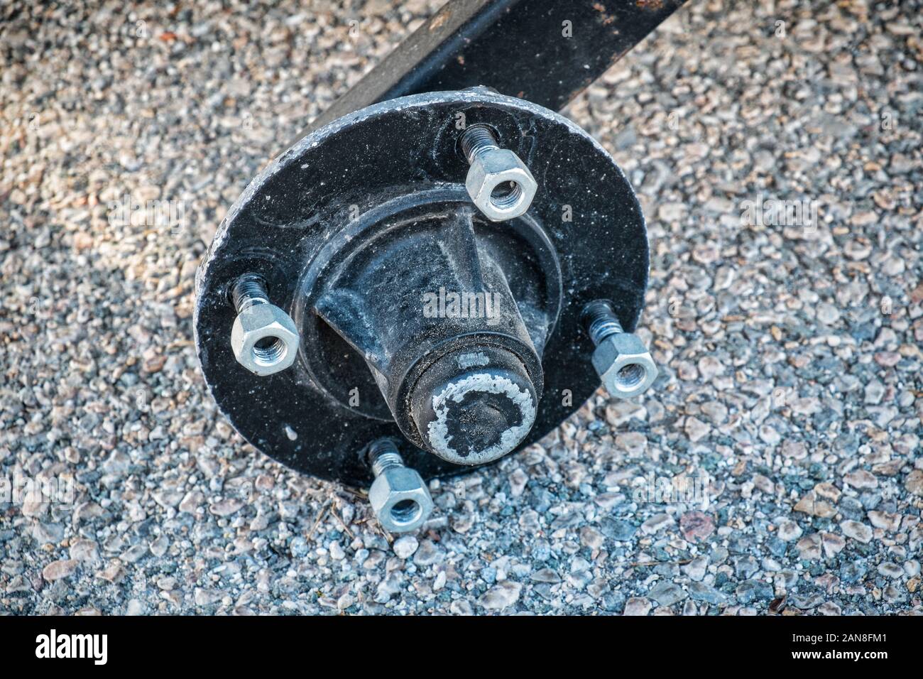 Wheel rim on a junk car trailer Stock Photo - Alamy