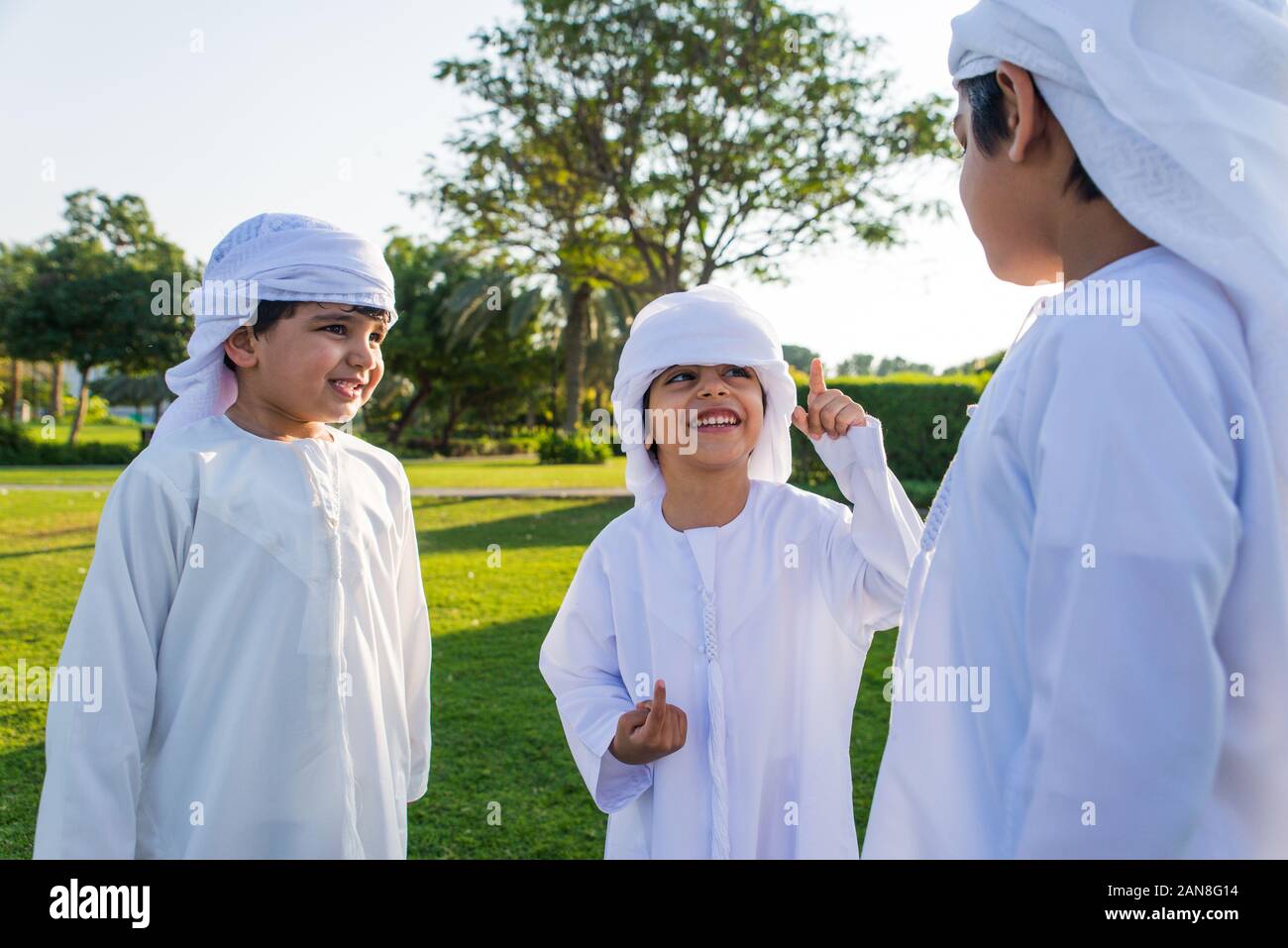 Children playing traditional uae hi-res stock photography and images ...
