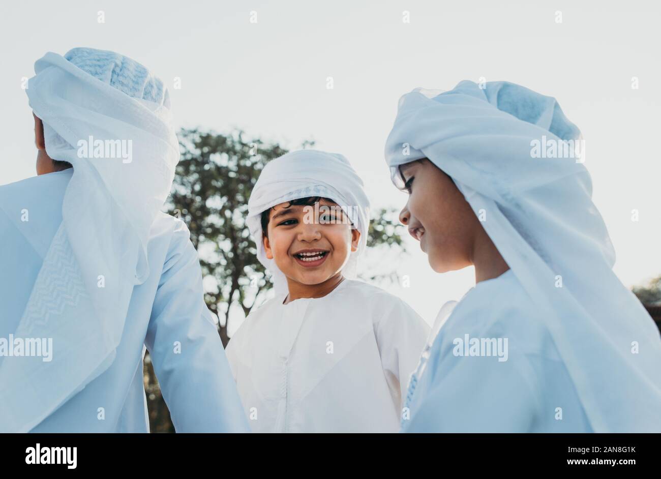 Emirati child playing hi-res stock photography and images - Alamy