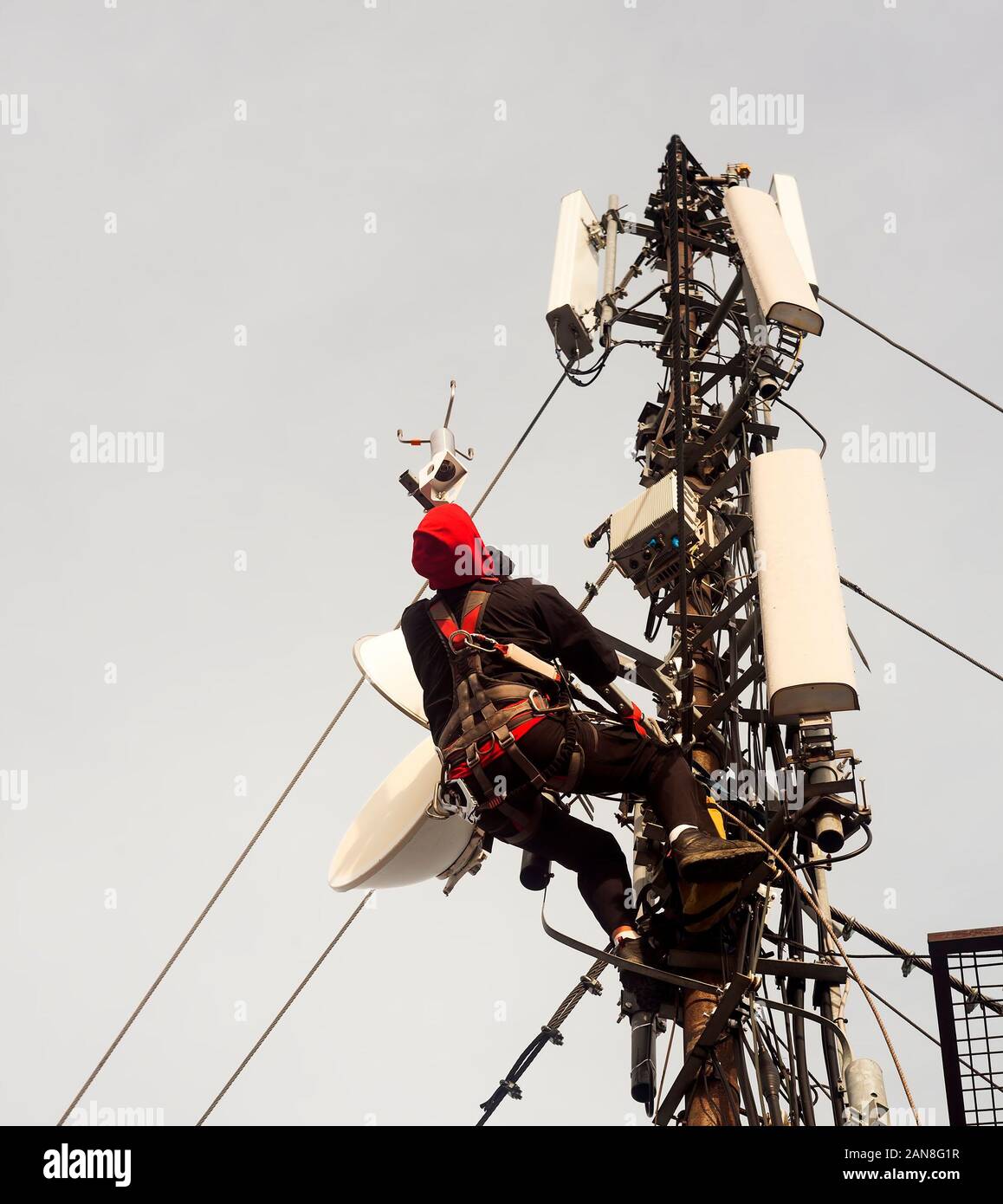 Worker climbing utility pole hi-res stock photography and images - Alamy
