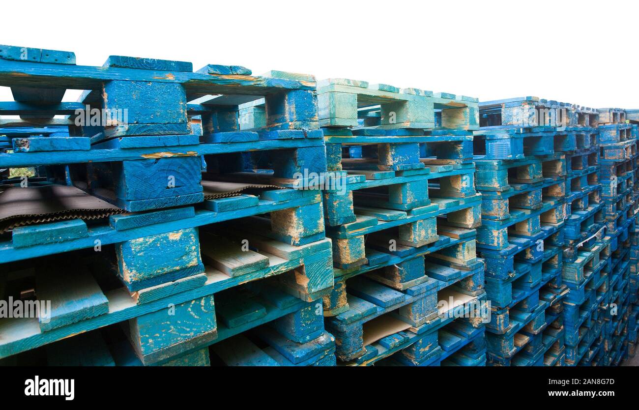 blue wooden pallets for cargo transport isolated on white Stock Photo ...