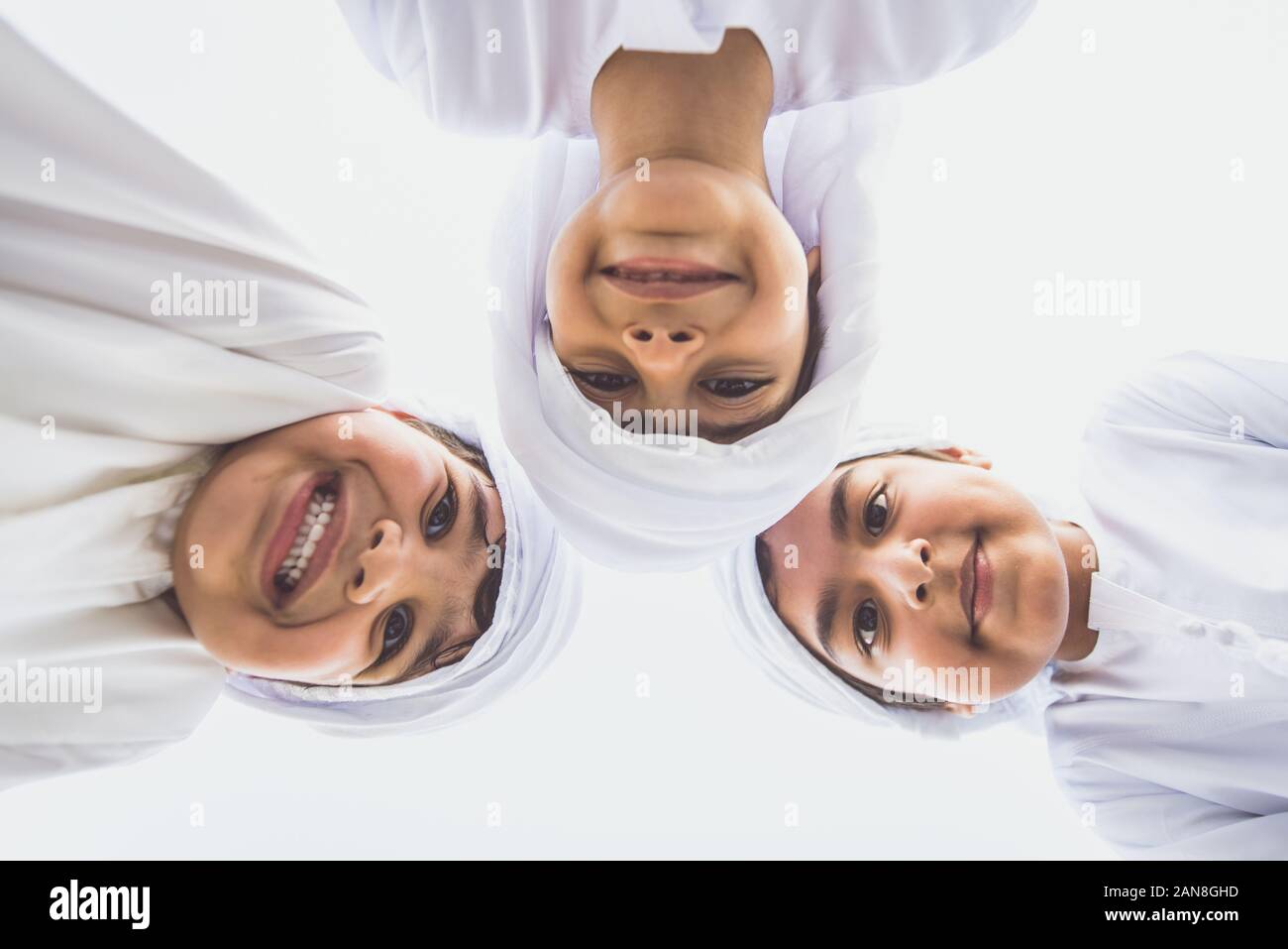 Children playing traditional uae hi-res stock photography and images ...