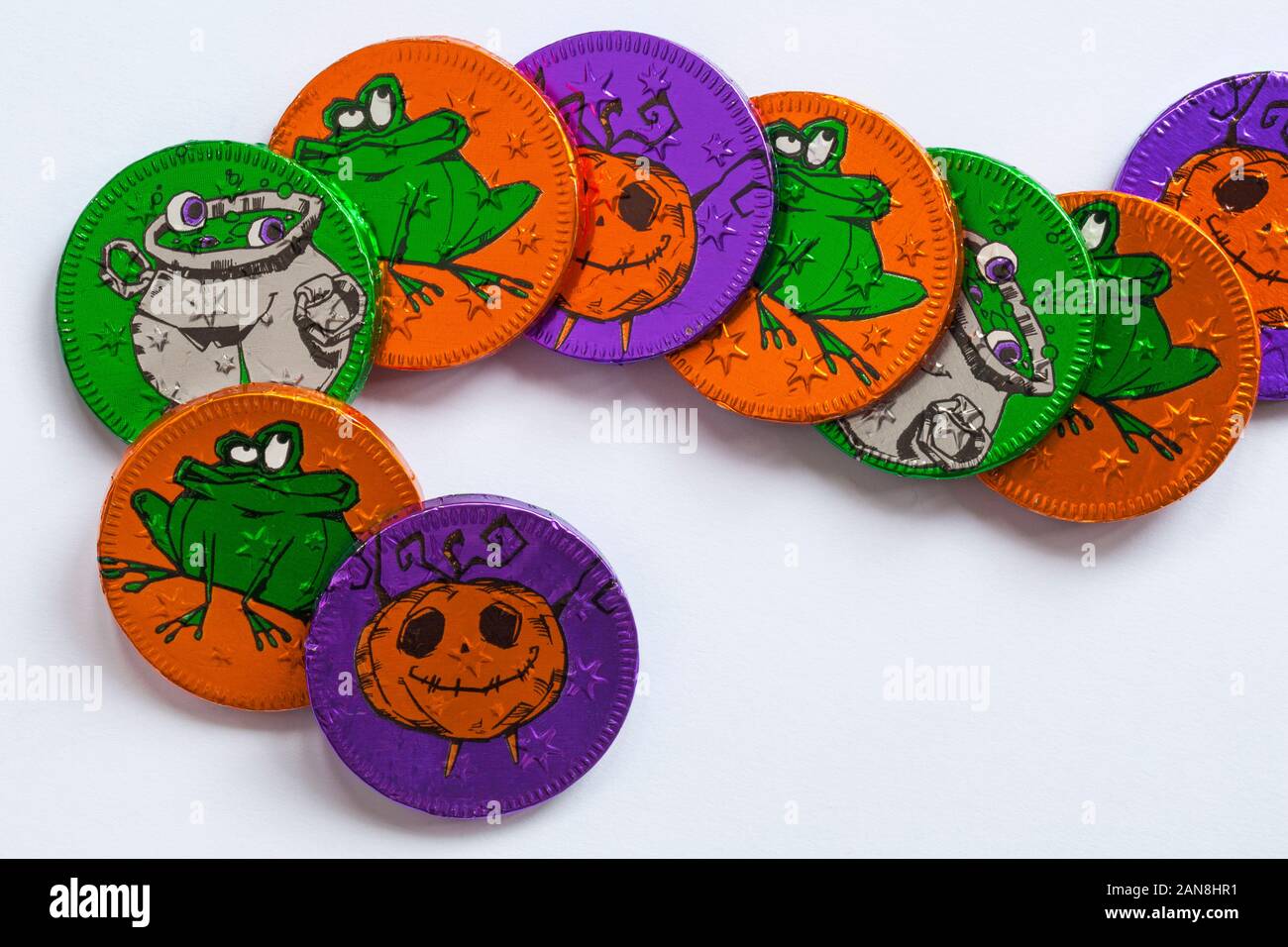 Halloween Belgian milk chocolate coins set on white background - ideal ...