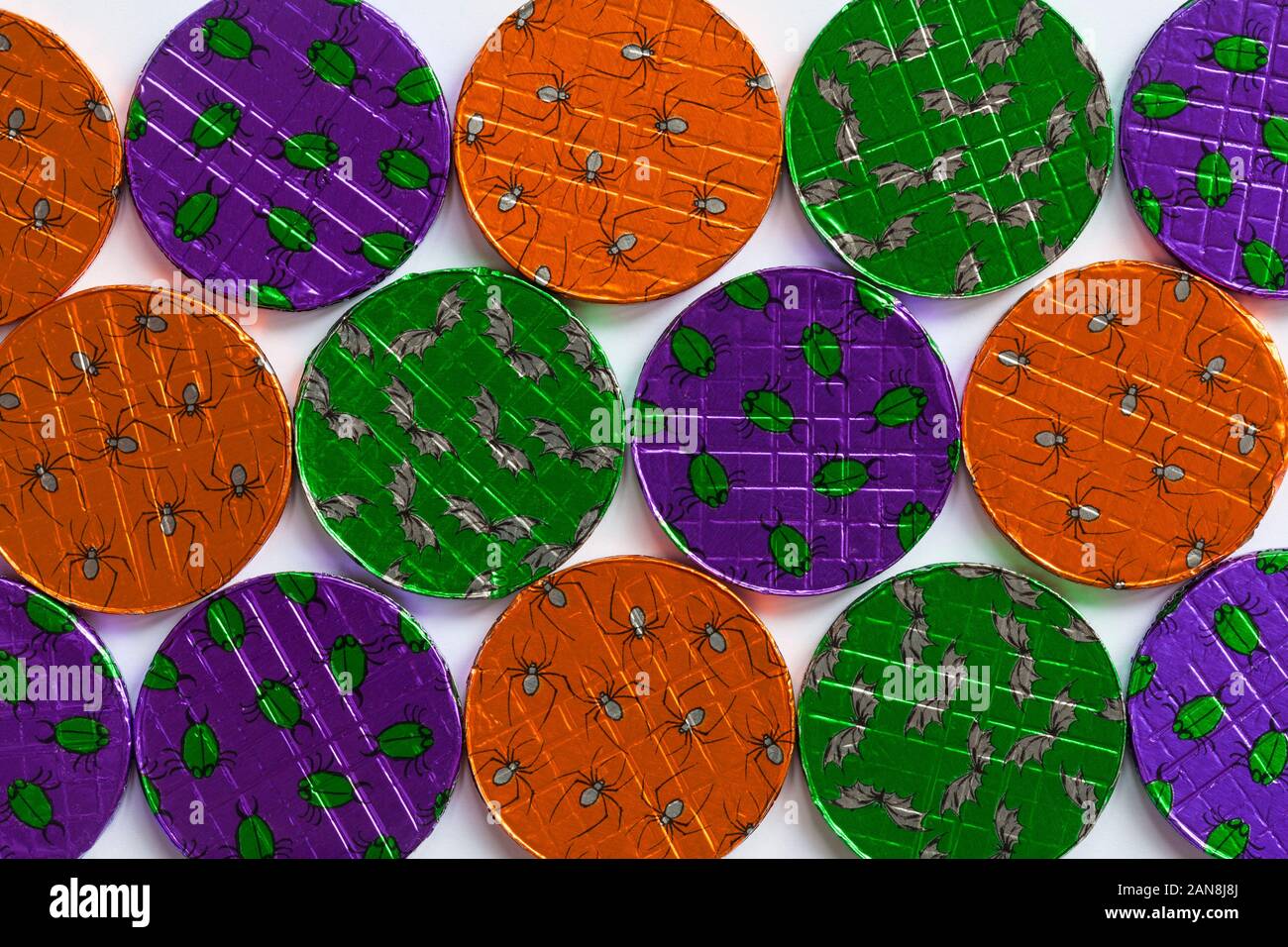 Halloween Belgian milk chocolate coins spread out set on white ...