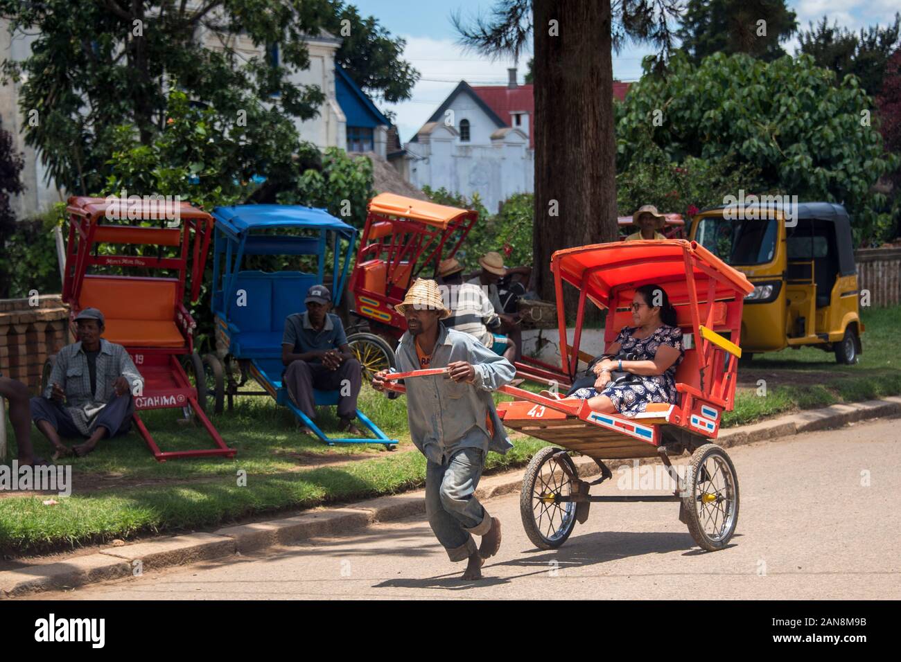 Hand pulled rickshaw in Antsirabe, Madagascar Stock Photo - Alamy