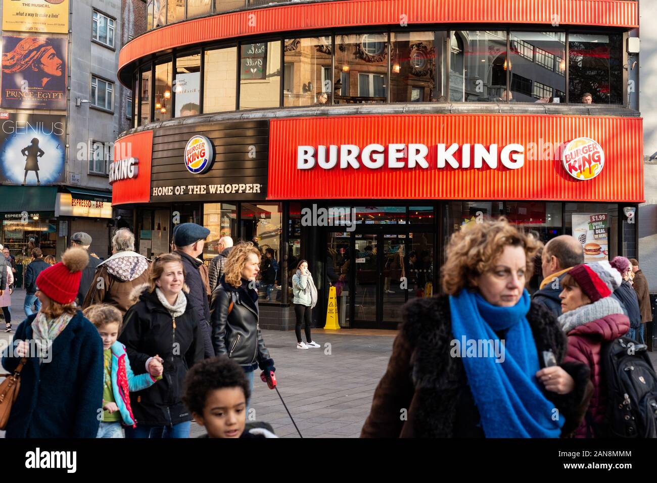 London shoppers busy urban view of people and tourists outside Burger ...