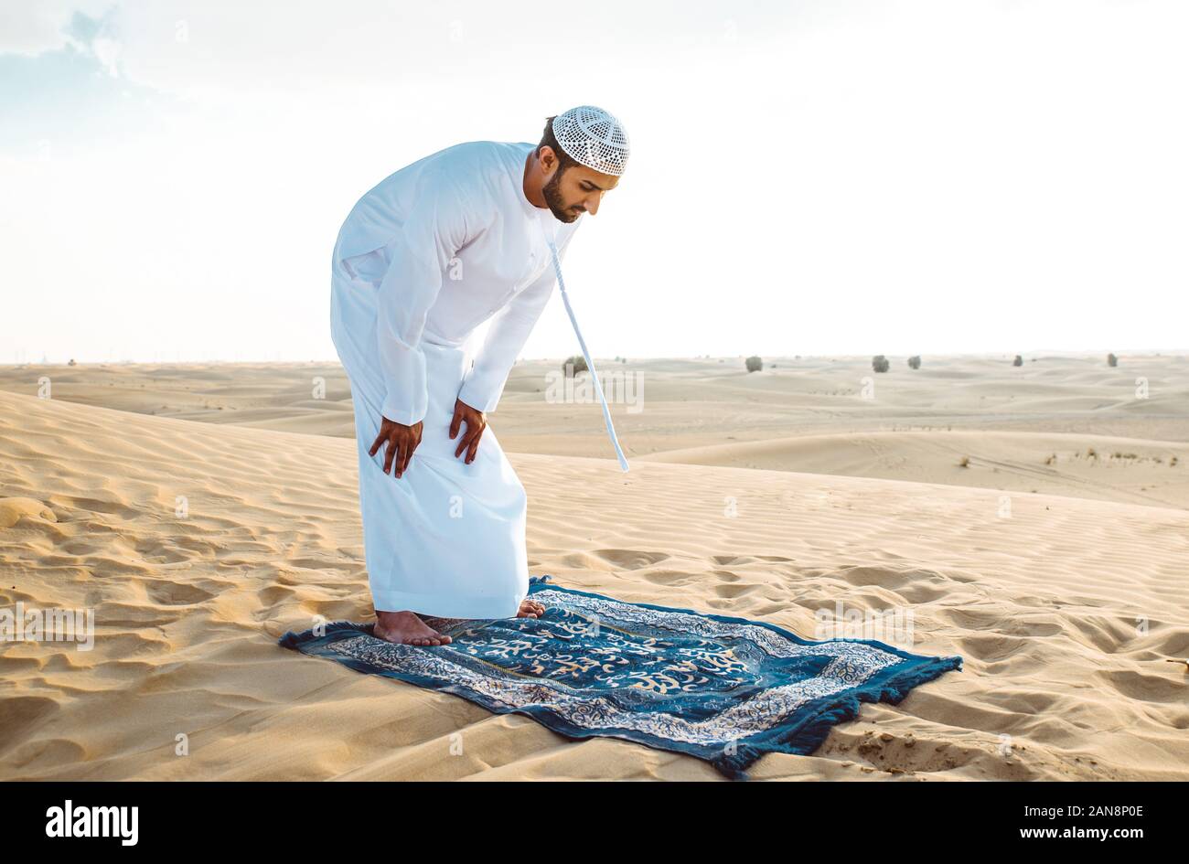 Muslim praying desert hi-res stock photography and images - Alamy