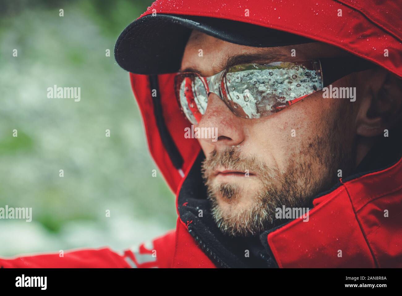 Men in red hi-res stock photography and images - Alamy