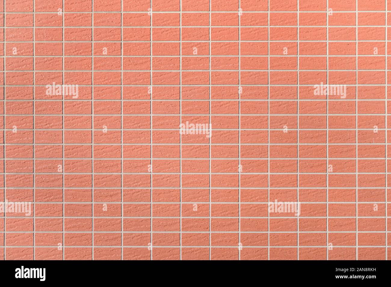Orange tile wall pattern background Stock Photo - Alamy