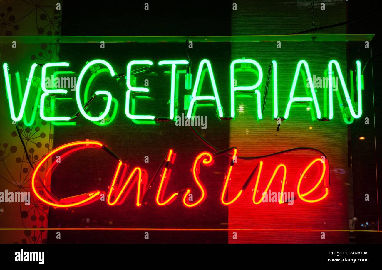 vegetarian restaurant neon sign in a window at night Stock Photo - Alamy