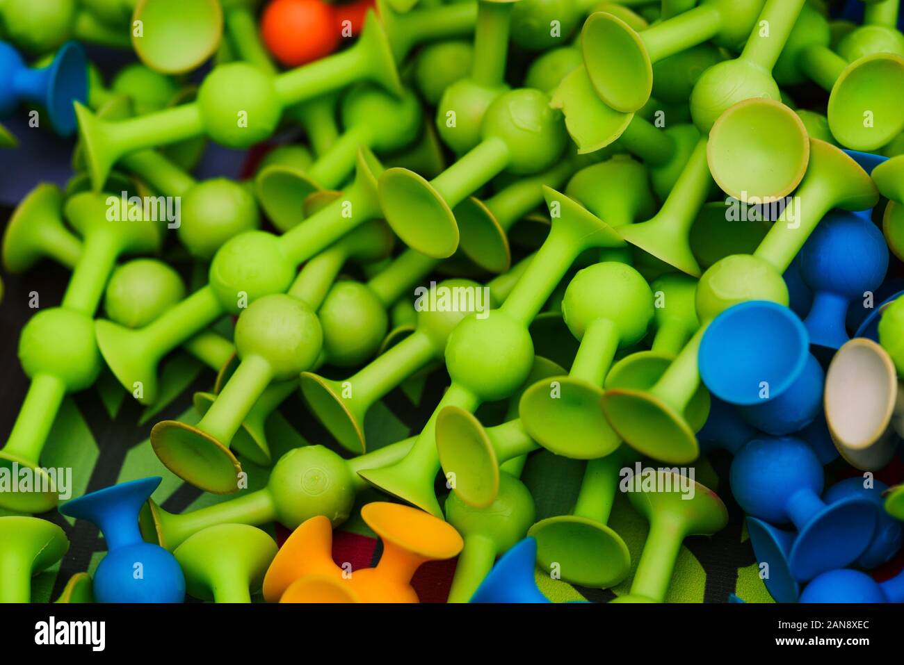 Green parts of a plastic constructor. Children's toys for the ...