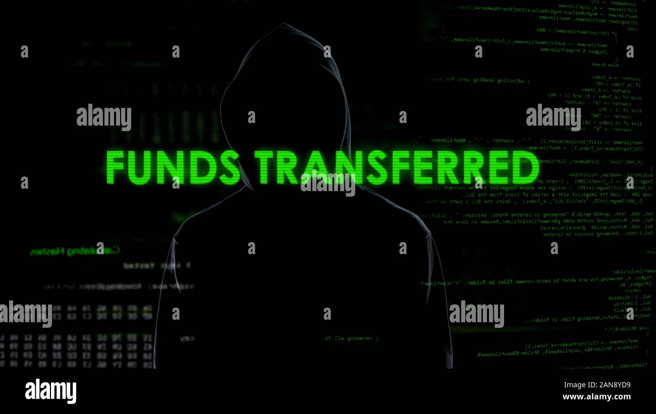 Male hacker transferring funds, money system protection, online banking ...