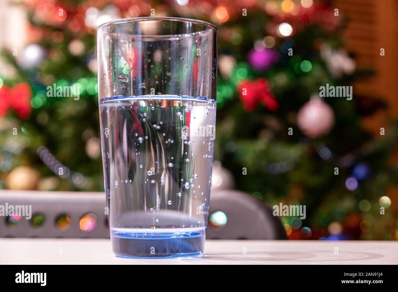 Mineral water glass christmas in abstract style on transparent ...