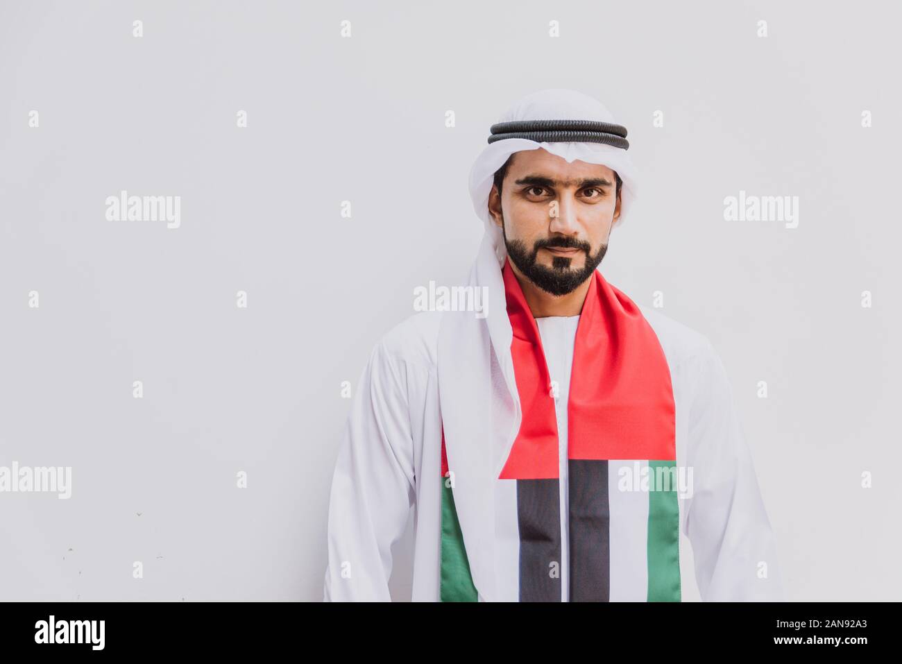 Beautiful middle eastern man wearing kandora traditional outfit in ...