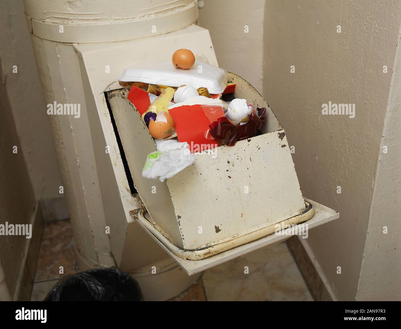 Rubbish chute hi-res stock photography and images - Alamy
