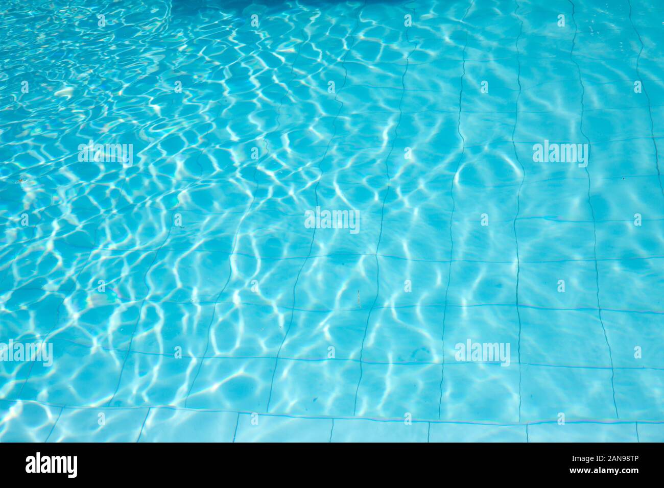 ripped water in swimming pool .surface of blue swimming pool,background ...