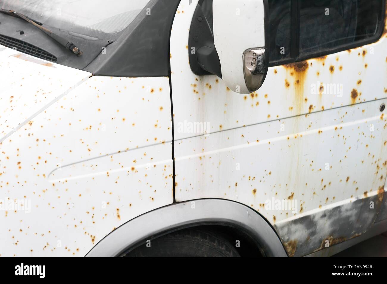 Corrosion on a car body, outdoor cropped image Stock Photo - Alamy