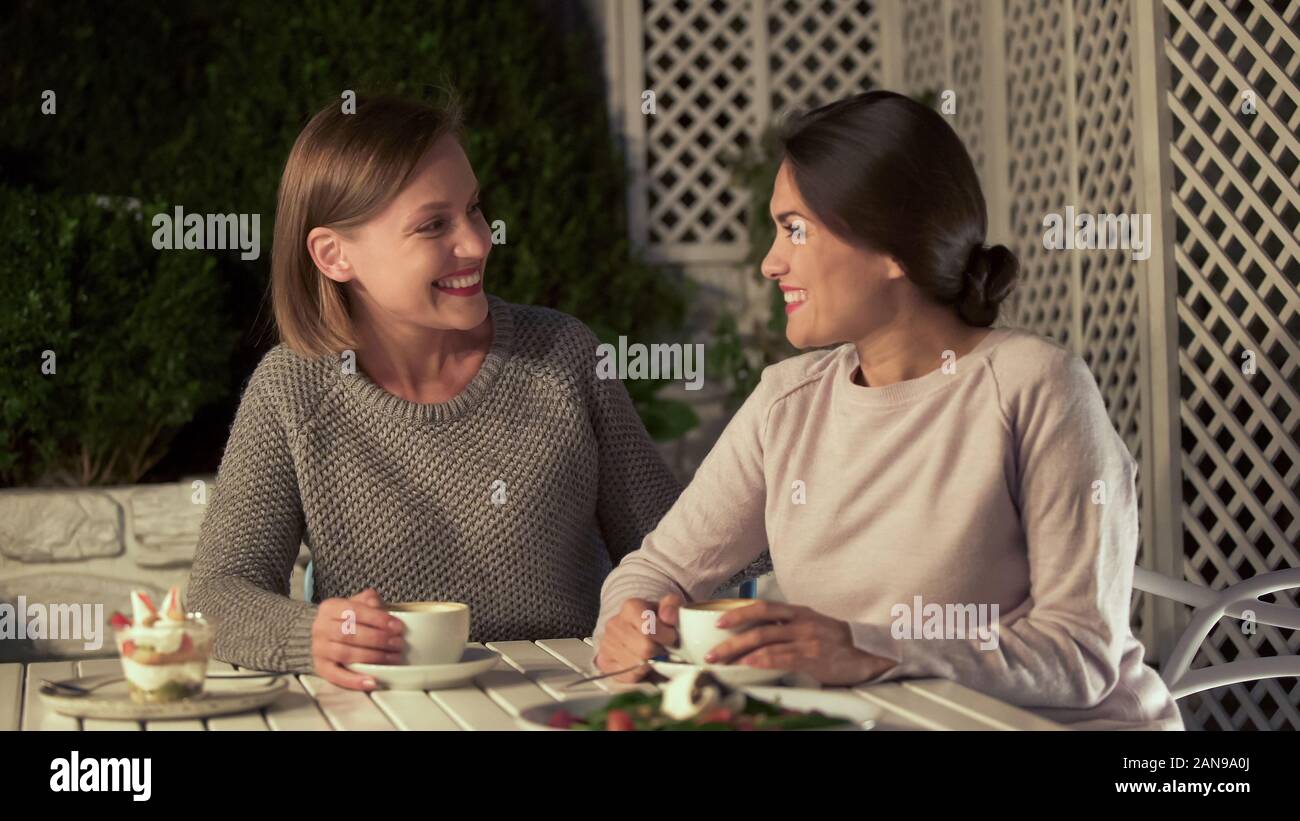 Family enjoying tea in cafe hi-res stock photography and images - Alamy