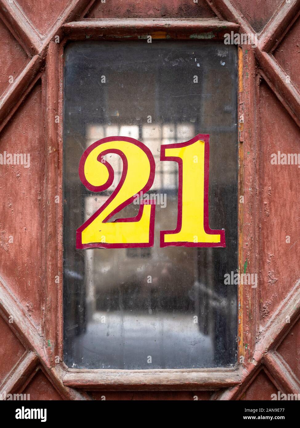Number 21, twenty one, street number sign on the door Stock Photo - Alamy