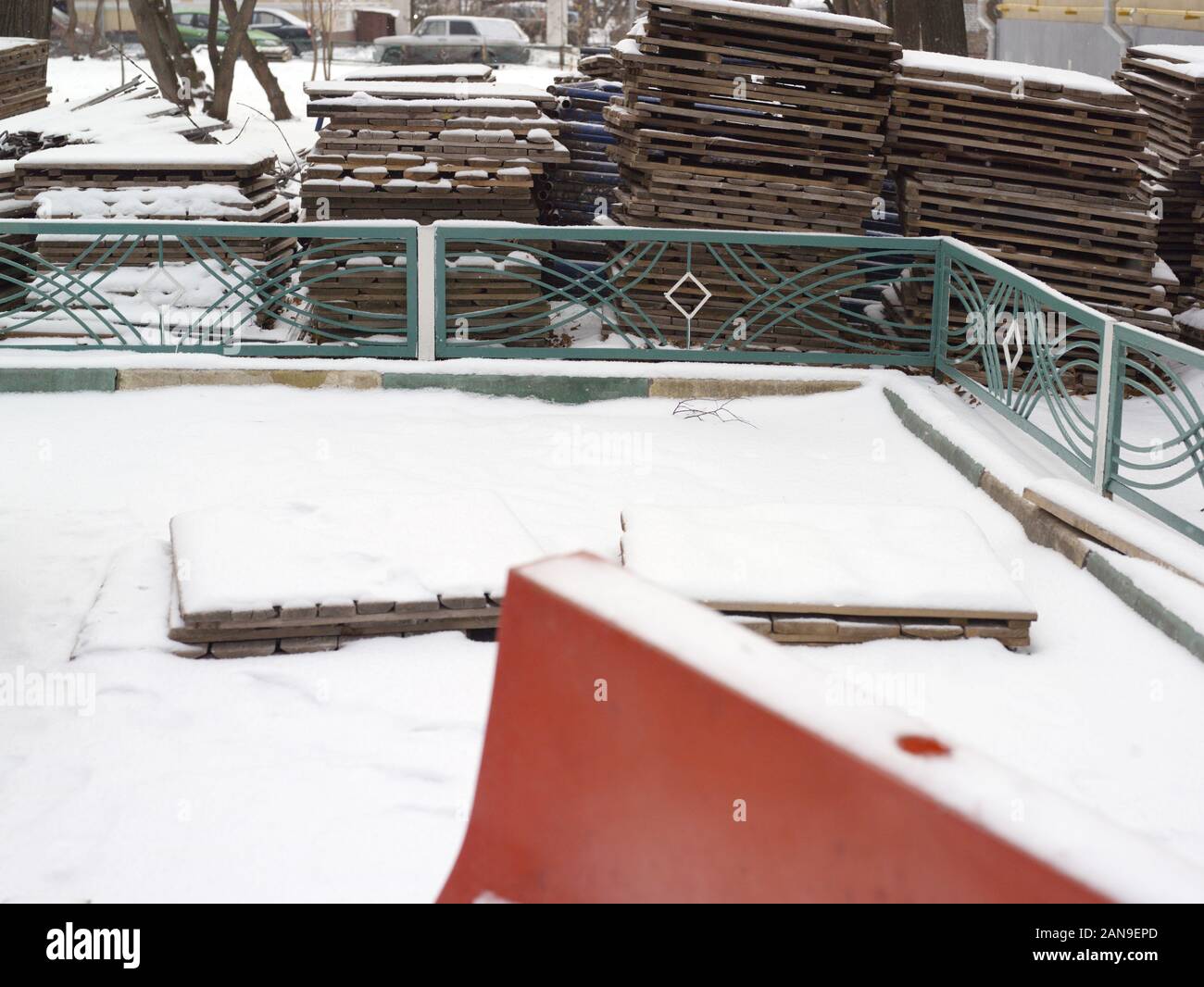 Mess left in the yard after renovation, urban winter scene Stock Photo ...
