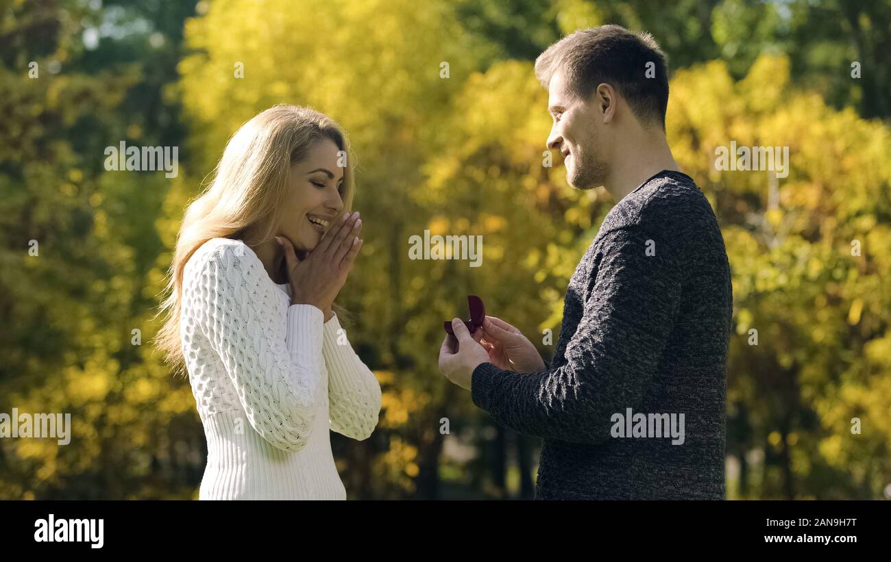 Happy young man proposes girlfriend hi-res stock photography and images ...