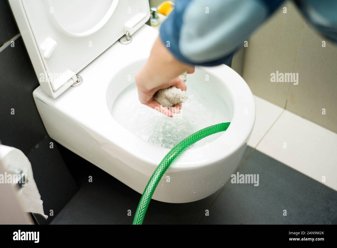 Leaking toilet hi-res stock photography and images - Alamy