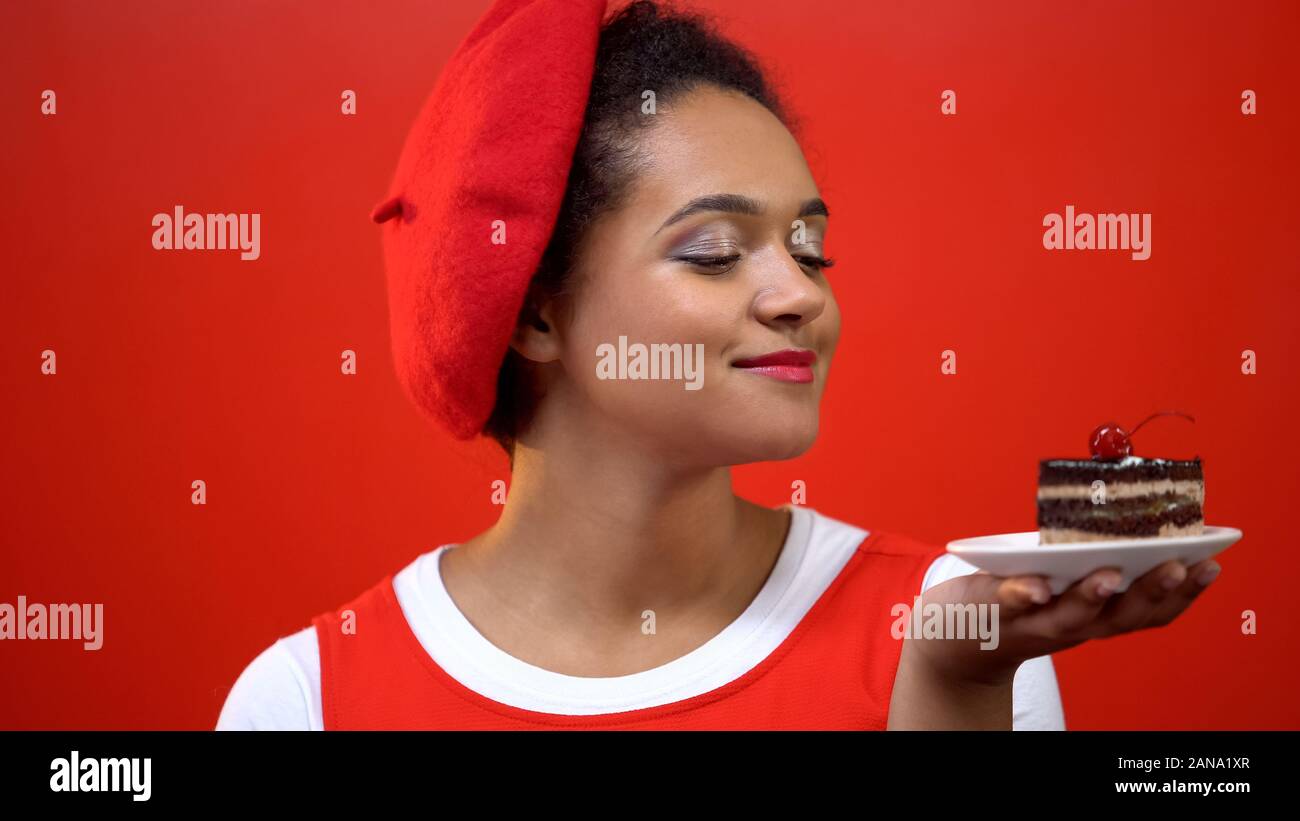 Looking at cake black person hi-res stock photography and images - Alamy