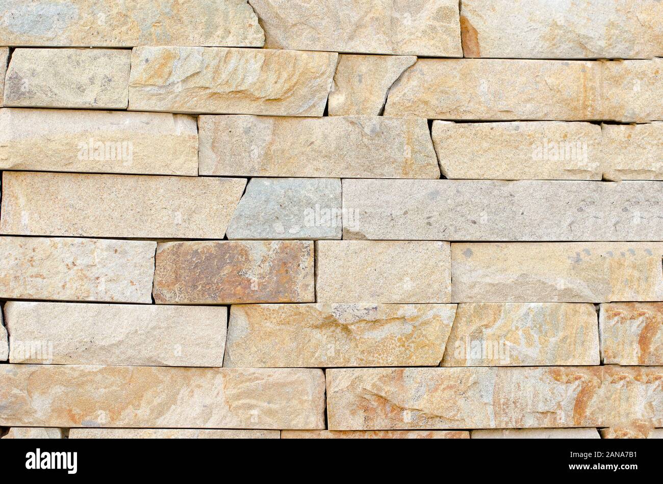 Stone wall at home texture background natural color Stock Photo - Alamy