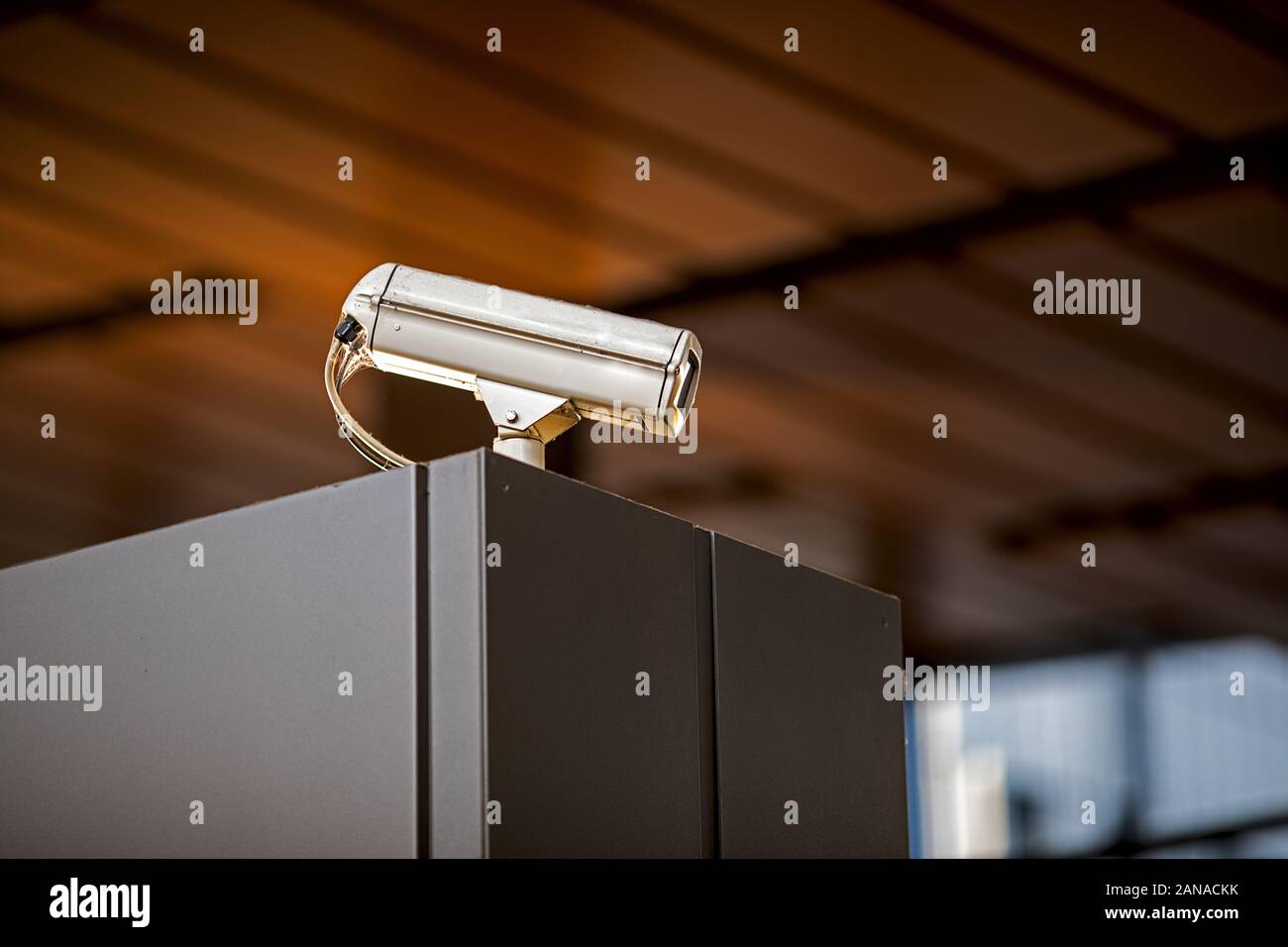 gray camera mounted on a tall cabinet for surveillance and crime ...