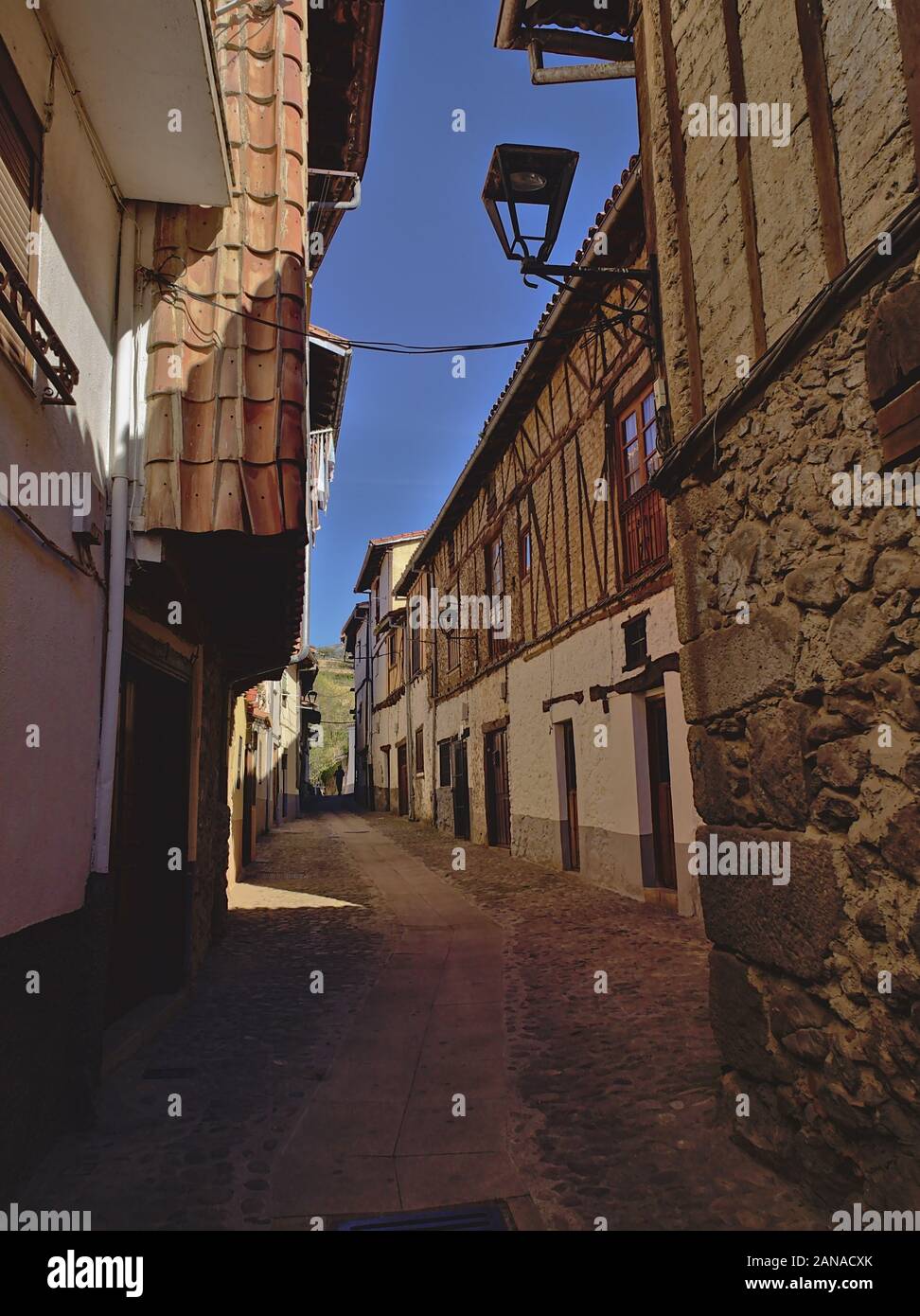 Typical street Jewish neighborhood of Hervas with stone masonry, adobe ...