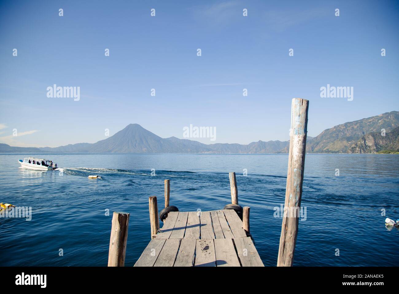 Lake Atitlan in Guatemala with volcanoes and mountain in the background ...