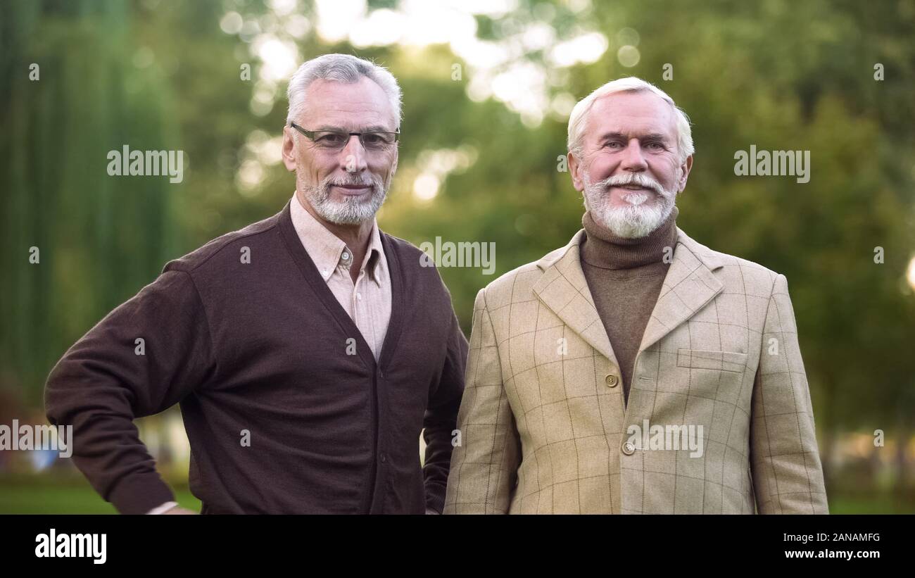 Elegant old men looking camera and smiling, happy retirement, success ...