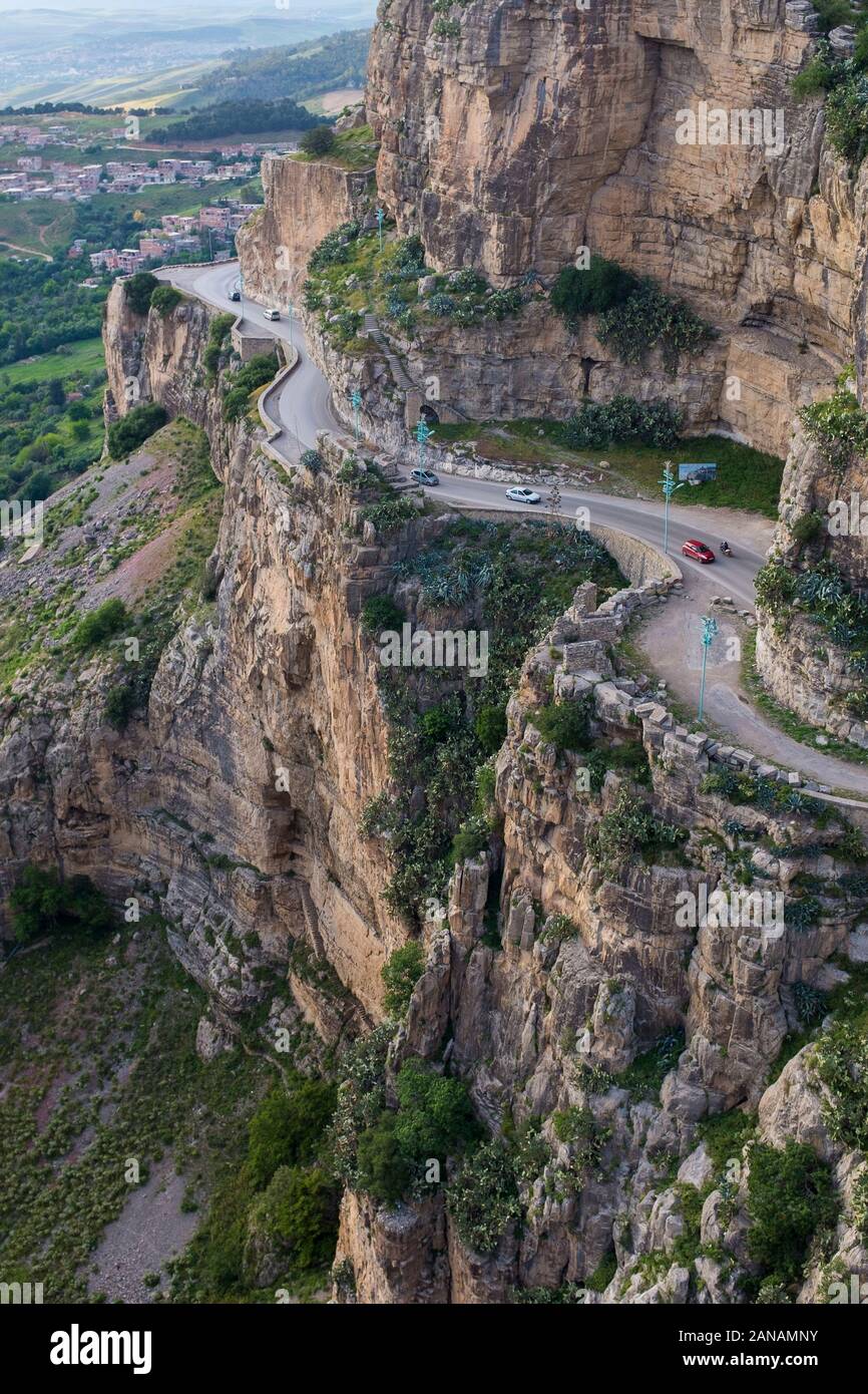 Roads cut into the cliffs on the opposite side of gorge in Constantine ...