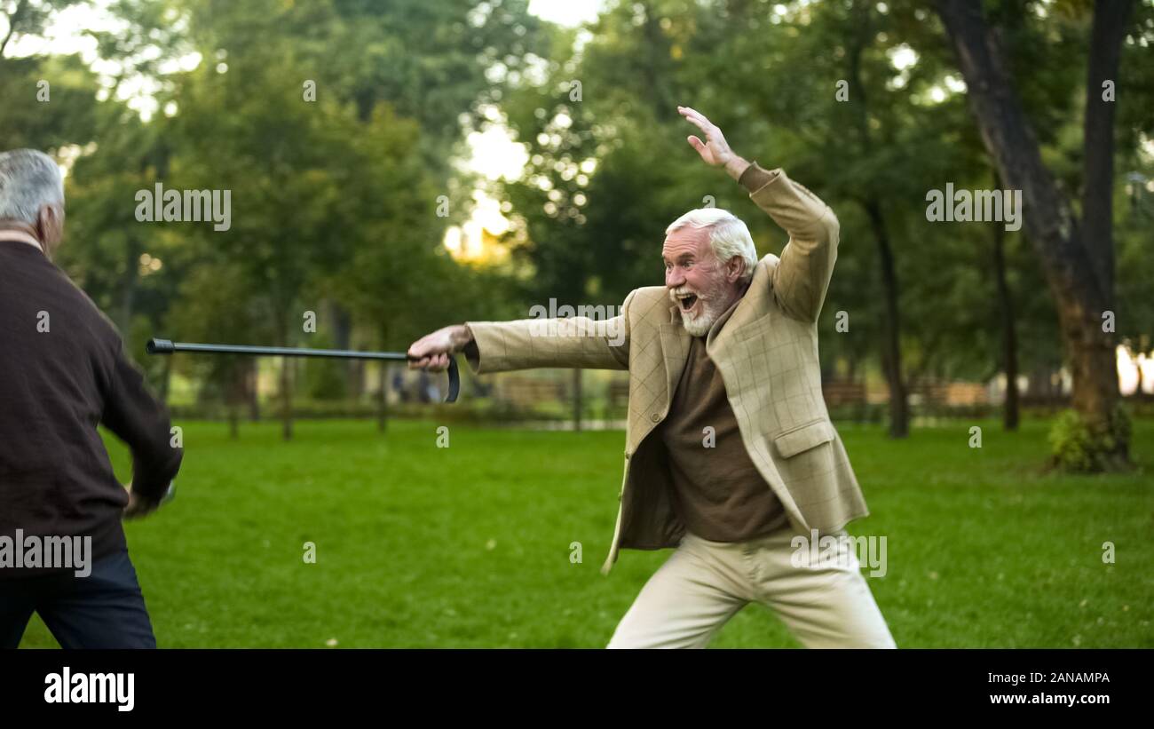 Mature men fighting hi-res stock photography and images - Alamy