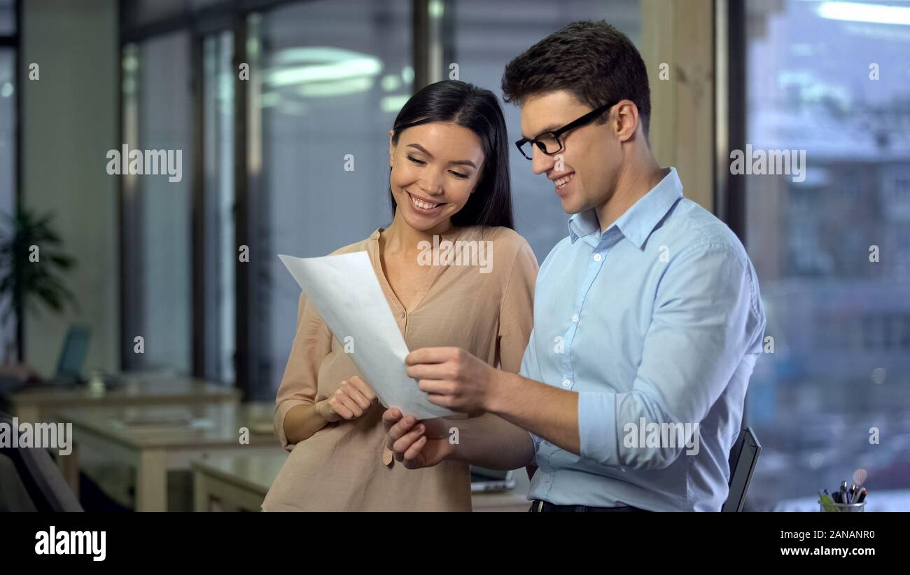 Happy work atmosphere hi-res stock photography and images - Alamy