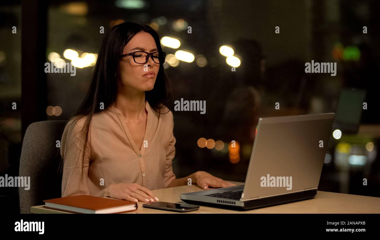 Depressed office worker with closed eyes laptop, failed project ...