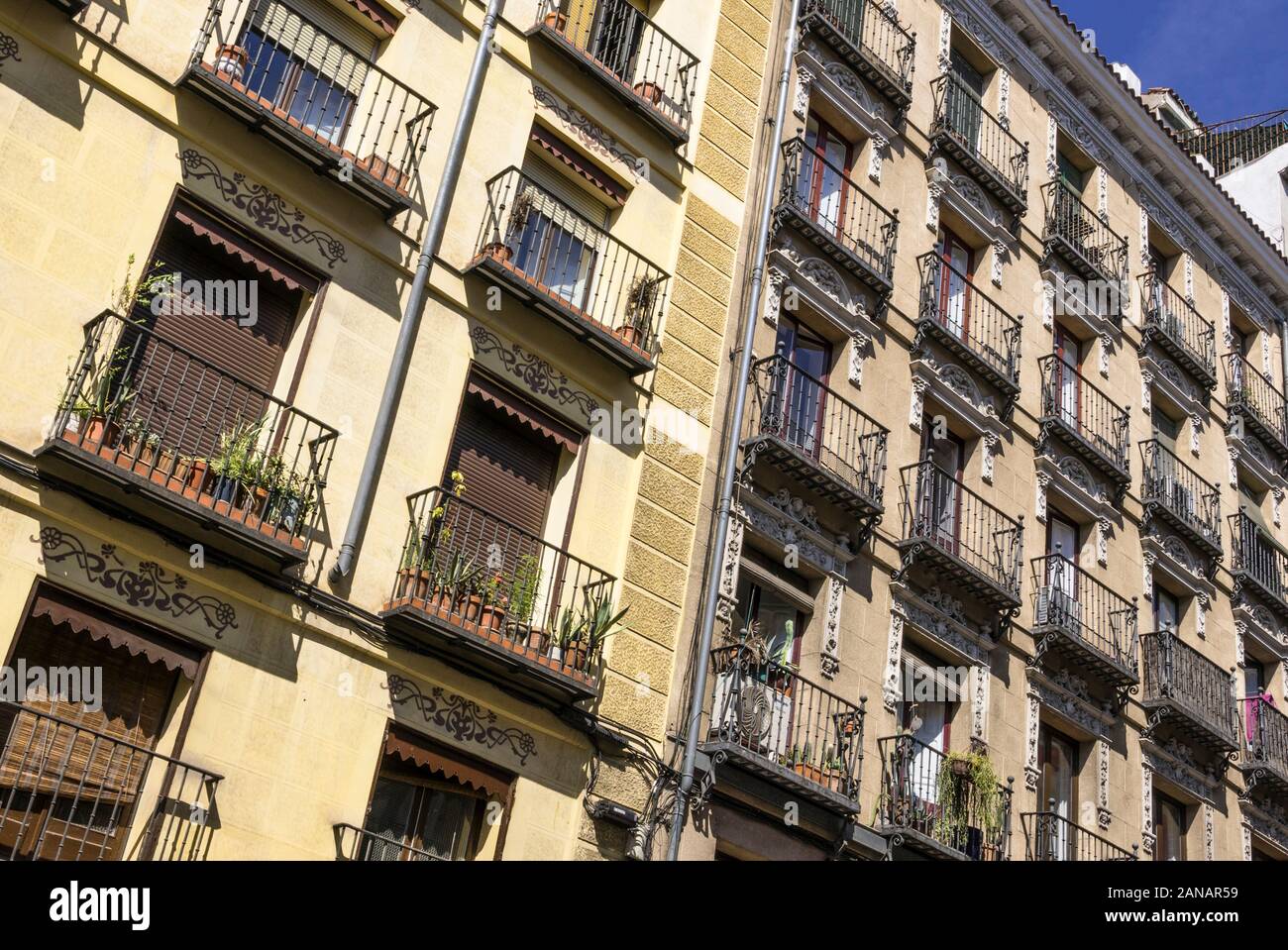 A Spanish building with balconies with wooden shutters in Madrid, Spain ...