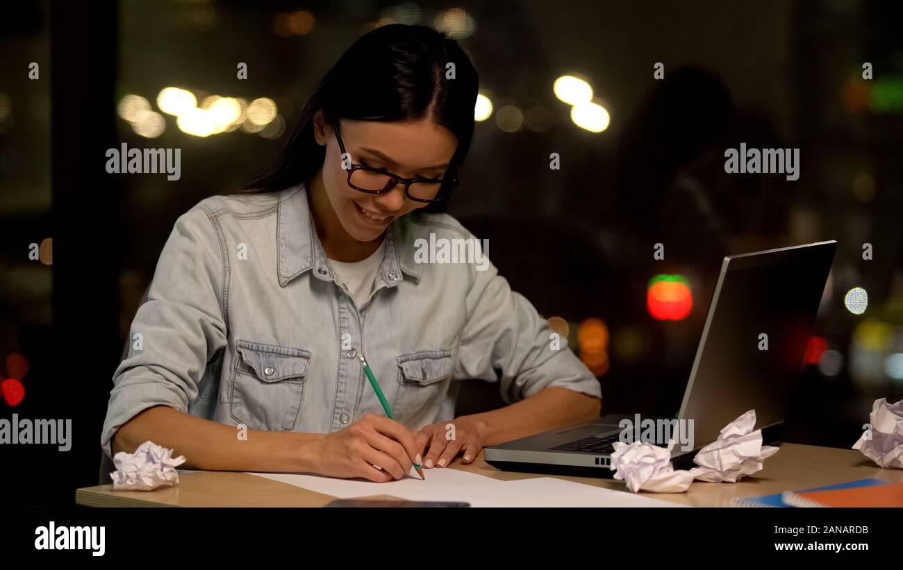 Fashion designer drawing clothing sketches, full of inspiration and ...
