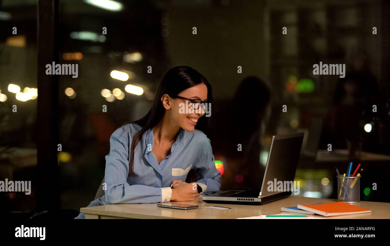 Happy woman reading email on office laptop, job offer, work promotion ...