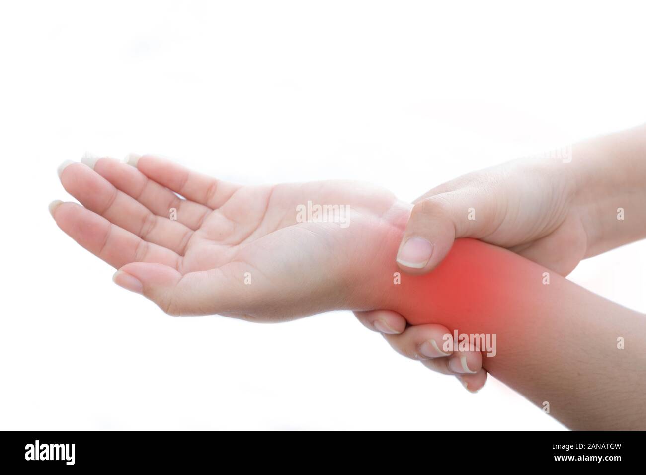 The woman holds on to the sore wrist at white background, Inflamed hand ...